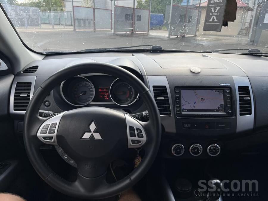 Zils Mitsubishi Outlander 2007 Daugavpils, ar dzinēja tilpumu 2.00 L un nobraukumu 393 tūkst. km par 2200 €, foto 12 vietnē AUTOMOTO.COM.LV