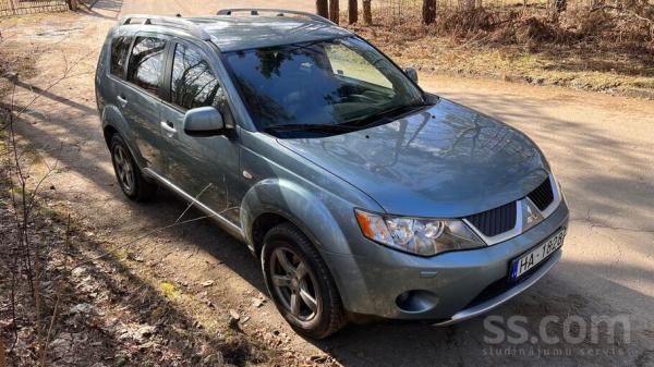 Blue Mitsubishi Outlander 2008 in Ogre, with an engine capacity of 2.00 L and mileage of 204 thousand km for 10500 €, photo 2 on AUTOMOTO.COM.LV