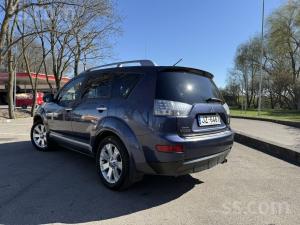 Zils Mitsubishi Outlander 2008 Rīga, ar dzinēja tilpumu 2.00 L un nobraukumu 289 tūkst. km par 2900 €, foto 6 vietnē AUTOMOTO.COM.LV