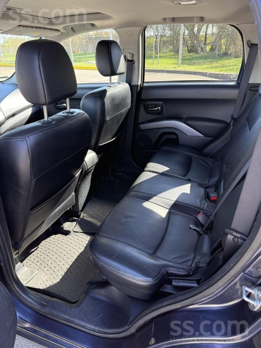 Zils Mitsubishi Outlander 2008 Rīga, ar dzinēja tilpumu 2.00 L un nobraukumu 289 tūkst. km par 2900 €, foto 12 vietnē AUTOMOTO.COM.LV