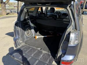 Zils Mitsubishi Outlander 2008 Rīga, ar dzinēja tilpumu 2.00 L un nobraukumu 289 tūkst. km par 2900 €, foto 14 vietnē AUTOMOTO.COM.LV
