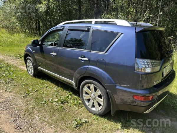 Zils Mitsubishi Outlander 2008 Daugavpils, ar dzinēja tilpumu 2.40 L un nobraukumu 297 tūkst. km par 2400 €, foto 5 vietnē AUTOMOTO.COM.LV