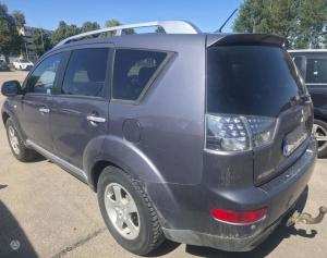 Blue Mitsubishi Outlander 2008 in Marijampole, with an engine capacity of 2.18 L and mileage of 320 thousand km for 2750 €, photo 3 on AUTOMOTO.COM.LV