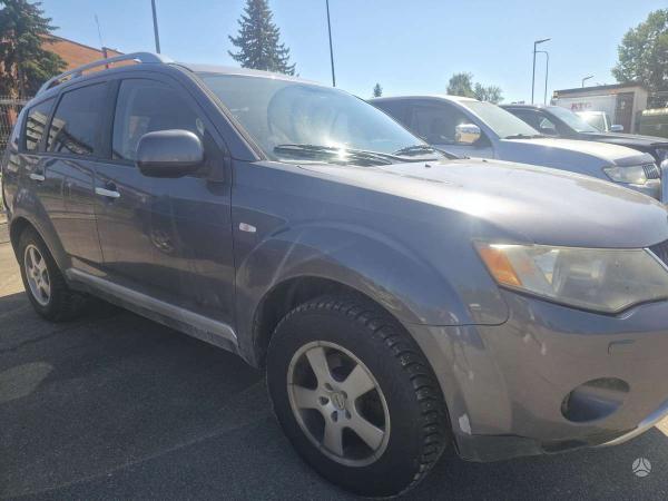 Zils Mitsubishi Outlander 2008 Marijampole, ar dzinēja tilpumu 2.18 L un nobraukumu 320 tūkst. km par 2750 €, foto 4 vietnē AUTOMOTO.COM.LV