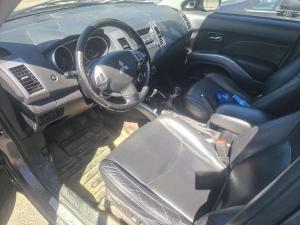 Blue Mitsubishi Outlander 2008 in Marijampole, with an engine capacity of 2.18 L and mileage of 320 thousand km for 2750 €, photo 7 on AUTOMOTO.COM.LV
