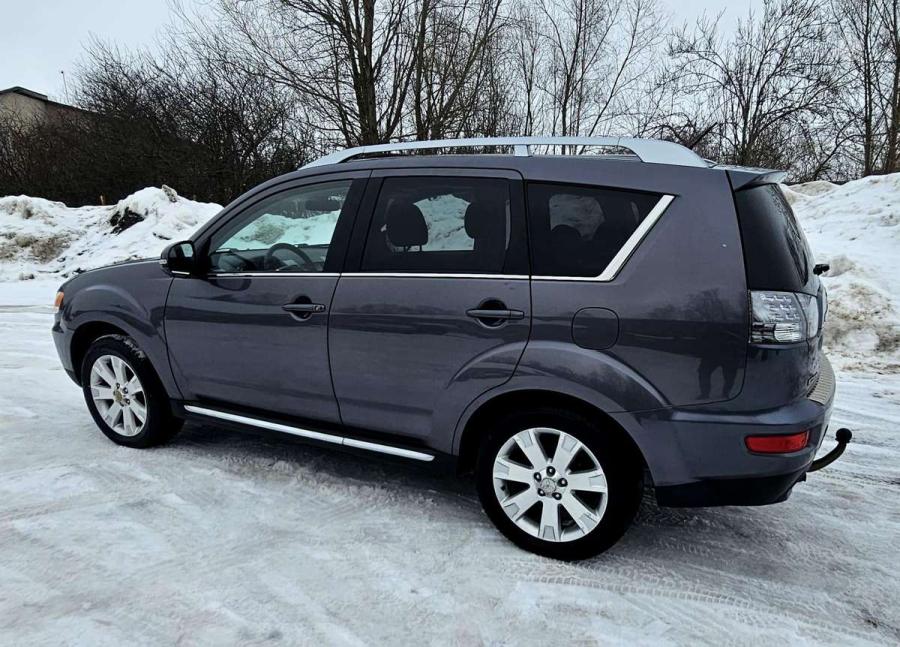 Blue Mitsubishi Outlander 2009 in Klaipeda, with an engine capacity of 2.20 L and mileage of 264 thousand km for 5299 €, photo 6 on AUTOMOTO.COM.LV