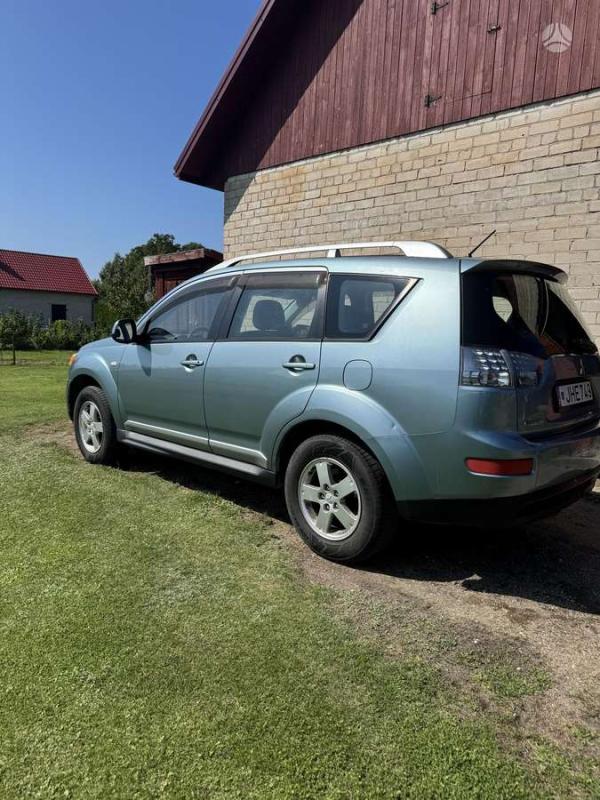 Blue Mitsubishi Outlander 2009 in Klaipeda, with an engine capacity of 1.97 L and mileage of 218 thousand km for 2500 €, photo 2 on AUTOMOTO.COM.LV