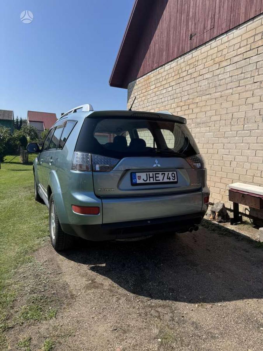 Zils Mitsubishi Outlander 2009 Klaipėda, ar dzinēja tilpumu 1.97 L un nobraukumu 218 tūkst. km par 2500 €, foto 4 vietnē AUTOMOTO.COM.LV