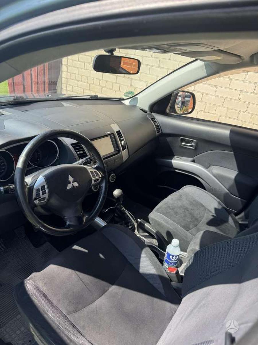 Zils Mitsubishi Outlander 2009 Klaipėda, ar dzinēja tilpumu 1.97 L un nobraukumu 218 tūkst. km par 2500 €, foto 5 vietnē AUTOMOTO.COM.LV