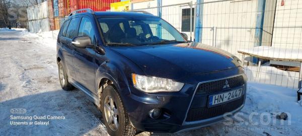 Zils Mitsubishi Outlander 2010 Rīga, ar dzinēja tilpumu 2.20 L un nobraukumu 350 tūkst. km par 3480 €, foto 6 vietnē AUTOMOTO.COM.LV