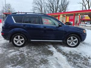 Zils Mitsubishi Outlander 2011 Rīga, ar dzinēja tilpumu 2.20 L un nobraukumu 320 tūkst. km par 4000 €, foto 10 vietnē AUTOMOTO.COM.LV