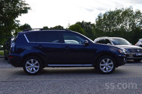 Blue Mitsubishi Outlander 2011 in Tukums, with an engine capacity of 2.20 L and mileage of 183 thousand km for 6795 €, photo 7 on AUTOMOTO.COM.LV