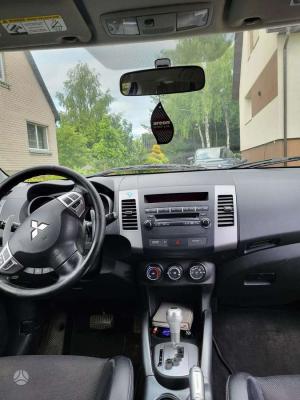 Zils Mitsubishi Outlander 2011 Šauļi, ar dzinēja tilpumu 2.36 L un nobraukumu 244 tūkst. km par 2400 €, foto 5 vietnē AUTOMOTO.COM.LV