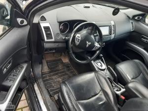 Blue Mitsubishi Outlander 2011 in Kaunas, with an engine capacity of 2.40 L and mileage of 240 thousand km for 1790 €, photo 6 on AUTOMOTO.COM.LV