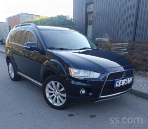 Zils Mitsubishi Outlander 2011 Rīga, ar dzinēja tilpumu 2.40 L un nobraukumu 257 tūkst. km par 5300 €, foto 5 vietnē AUTOMOTO.COM.LV