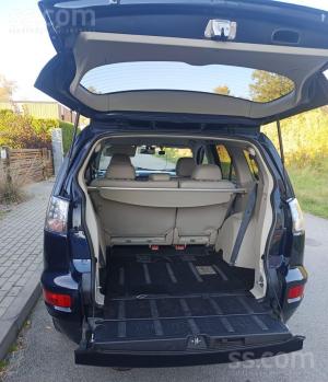 Zils Mitsubishi Outlander 2011 Rīga, ar dzinēja tilpumu 2.40 L un nobraukumu 257 tūkst. km par 5300 €, foto 11 vietnē AUTOMOTO.COM.LV