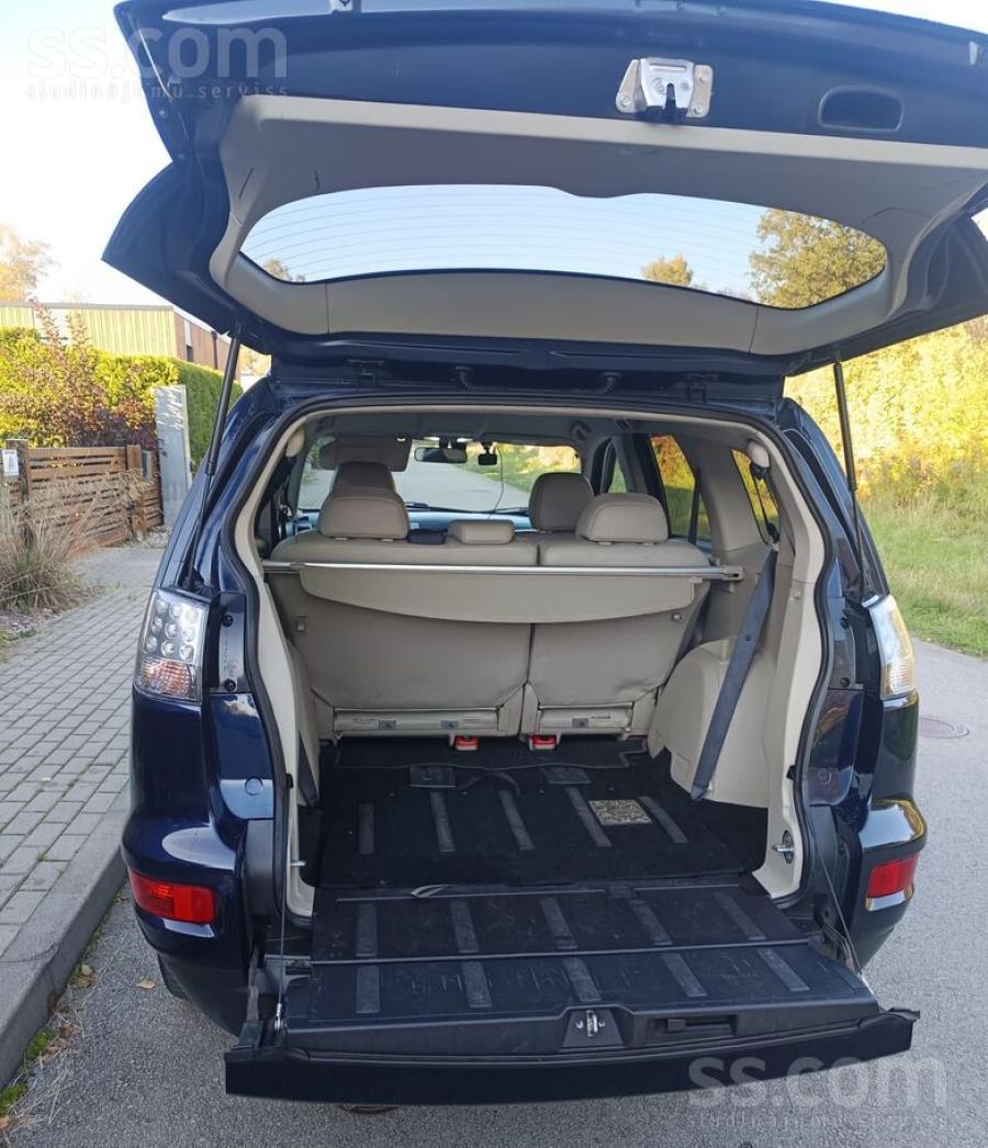 Zils Mitsubishi Outlander 2011 Rīga, ar dzinēja tilpumu 2.40 L un nobraukumu 257 tūkst. km par 5300 €, foto 11 vietnē AUTOMOTO.COM.LV