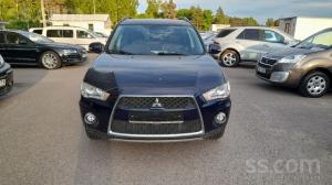 Zils Mitsubishi Outlander 2012 Rīga, ar dzinēja tilpumu 2.20 L un nobraukumu 212 tūkst. km par 6900 €, foto  vietnē AUTOMOTO.COM.LV