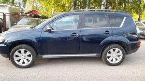 Blue Mitsubishi Outlander 2012 in Riga, with an engine capacity of 2.20 L and mileage of 212 thousand km for 6900 €, photo 12 on AUTOMOTO.COM.LV