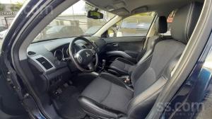 Blue Mitsubishi Outlander 2012 in Riga, with an engine capacity of 2.20 L and mileage of 212 thousand km for 6900 €, photo 13 on AUTOMOTO.COM.LV