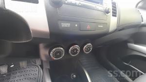 Blue Mitsubishi Outlander 2012 in Riga, with an engine capacity of 2.20 L and mileage of 212 thousand km for 6900 €, photo 18 on AUTOMOTO.COM.LV