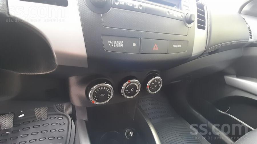 Blue Mitsubishi Outlander 2012 in Riga, with an engine capacity of 2.20 L and mileage of 212 thousand km for 6900 €, photo 18 on AUTOMOTO.COM.LV
