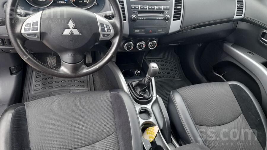 Blue Mitsubishi Outlander 2012 in Riga, with an engine capacity of 2.20 L and mileage of 212 thousand km for 6900 €, photo 20 on AUTOMOTO.COM.LV