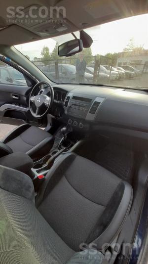 Blue Mitsubishi Outlander 2012 in Riga, with an engine capacity of 2.20 L and mileage of 212 thousand km for 6900 €, photo 34 on AUTOMOTO.COM.LV