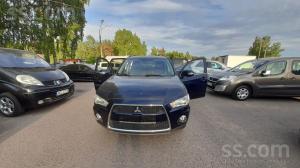 Blue Mitsubishi Outlander 2012 in Riga, with an engine capacity of 2.20 L and mileage of 212 thousand km for 6900 €, photo 35 on AUTOMOTO.COM.LV