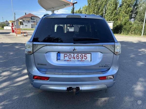 Zils Mitsubishi Outlander 2013 Tauragė, ar dzinēja tilpumu 2.00 L un nobraukumu 197 tūkst. km par 10300 €, foto 5 vietnē AUTOMOTO.COM.LV