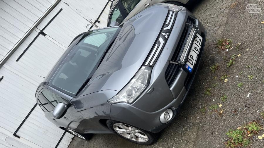 Blue Mitsubishi Outlander 2013 in Kaunas, with an engine capacity of 2.00 L and mileage of 292 thousand km for 3200 €, photo 3 on AUTOMOTO.COM.LV