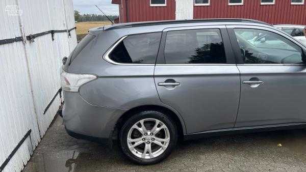 Zils Mitsubishi Outlander 2013 Kauņa, ar dzinēja tilpumu 2.00 L un nobraukumu 292 tūkst. km par 3200 €, foto 4 vietnē AUTOMOTO.COM.LV