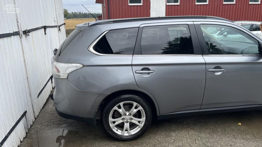 Blue Mitsubishi Outlander 2013 in Kaunas, with an engine capacity of 2.00 L and mileage of 292 thousand km for 3200 €, photo 4 on AUTOMOTO.COM.LV