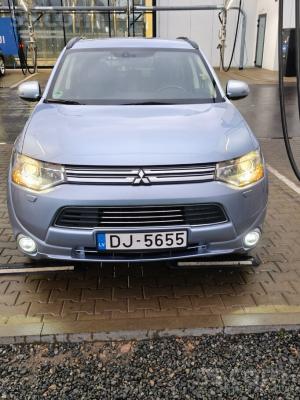Blue Mitsubishi Outlander 2013 in Riga, with an engine capacity of 2.00 L and mileage of 258 thousand km for 9200 €, photo  on AUTOMOTO.COM.LV
