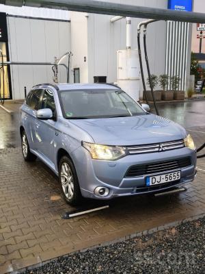 Zils Mitsubishi Outlander 2013 Rīga, ar dzinēja tilpumu 2.00 L un nobraukumu 258 tūkst. km par 9200 €, foto 4 vietnē AUTOMOTO.COM.LV