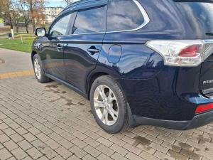 Blue Mitsubishi Outlander 2013 in Raseiniai, with an engine capacity of 2.27 L and mileage of 275 thousand km for 4900 €, photo 3 on AUTOMOTO.COM.LV