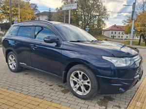 Blue Mitsubishi Outlander 2013 in Raseiniai, with an engine capacity of 2.27 L and mileage of 275 thousand km for 4900 €, photo 4 on AUTOMOTO.COM.LV
