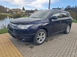 Blue Mitsubishi Outlander 2013 in Raseiniai, with an engine capacity of 2.27 L and mileage of 275 thousand km for 4900 €, photo 5 on AUTOMOTO.COM.LV