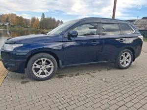 Blue Mitsubishi Outlander 2013 in Raseiniai, with an engine capacity of 2.27 L and mileage of 275 thousand km for 4900 €, photo 6 on AUTOMOTO.COM.LV