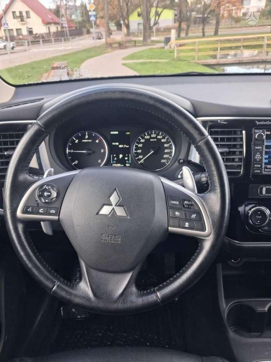 Blue Mitsubishi Outlander 2013 in Raseiniai, with an engine capacity of 2.27 L and mileage of 275 thousand km for 4900 €, photo 19 on AUTOMOTO.COM.LV
