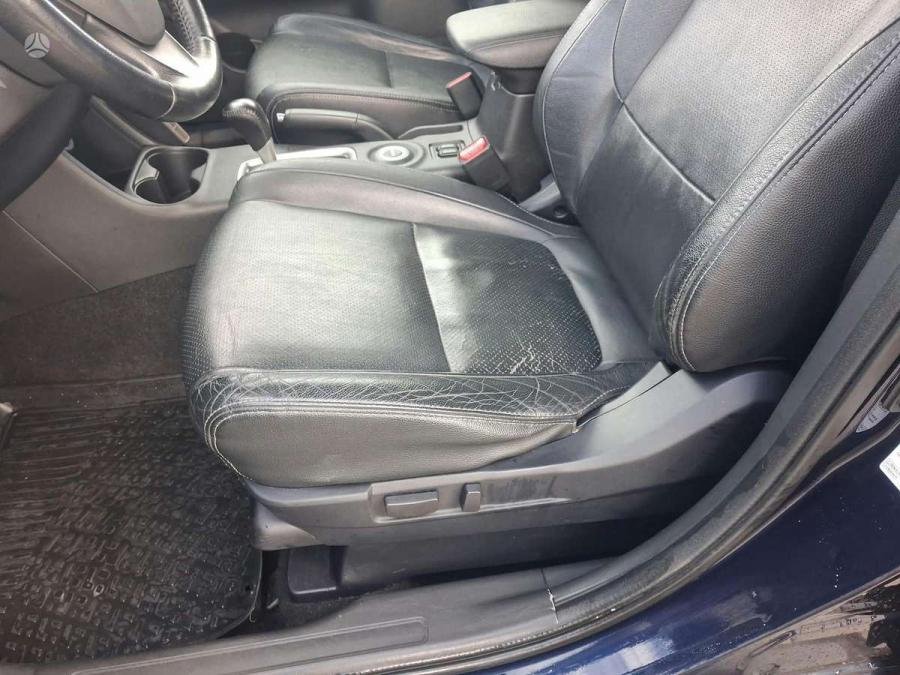 Blue Mitsubishi Outlander 2013 in Raseiniai, with an engine capacity of 2.27 L and mileage of 275 thousand km for 4900 €, photo 21 on AUTOMOTO.COM.LV