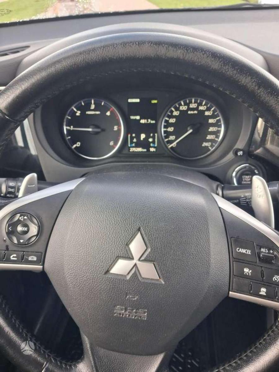Blue Mitsubishi Outlander 2013 in Raseiniai, with an engine capacity of 2.27 L and mileage of 275 thousand km for 4900 €, photo 34 on AUTOMOTO.COM.LV