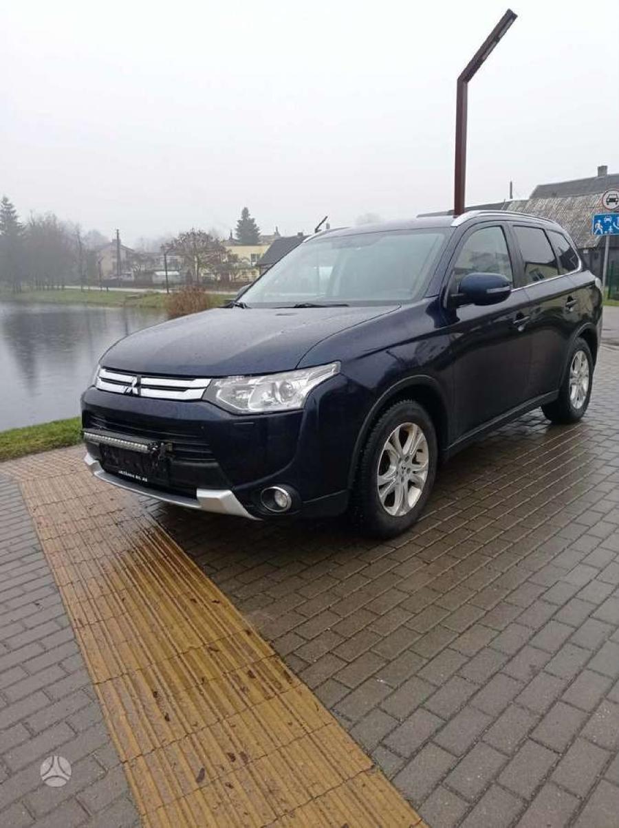Blue Mitsubishi Outlander 2014 in Raseiniai, with an engine capacity of 2.00 L and mileage of 189 thousand km for 7400 €, photo 1 on AUTOMOTO.COM.LV