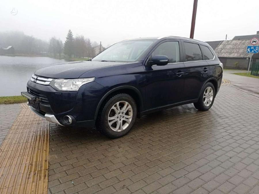 Blue Mitsubishi Outlander 2014 in Raseiniai, with an engine capacity of 2.00 L and mileage of 189 thousand km for 7400 €, photo 7 on AUTOMOTO.COM.LV
