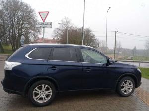 Blue Mitsubishi Outlander 2014 in Raseiniai, with an engine capacity of 2.00 L and mileage of 189 thousand km for 7400 €, photo 12 on AUTOMOTO.COM.LV