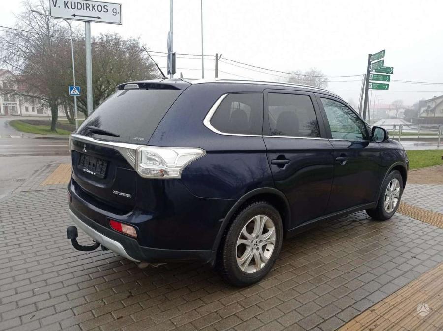 Blue Mitsubishi Outlander 2014 in Raseiniai, with an engine capacity of 2.00 L and mileage of 189 thousand km for 7400 €, photo 13 on AUTOMOTO.COM.LV