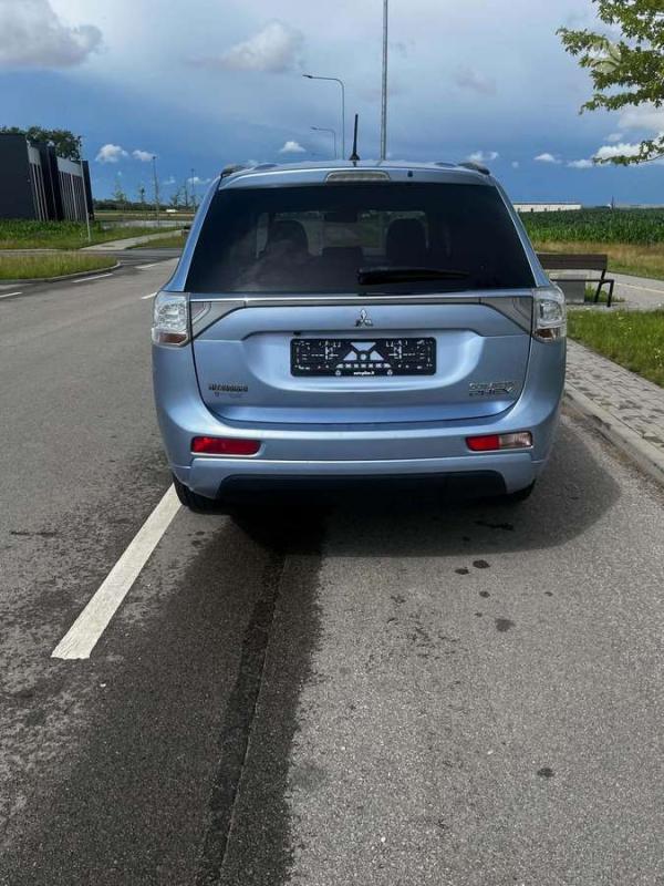 Blue Mitsubishi Outlander 2014 in Marijampole, with an engine capacity of 2.00 L and mileage of 289 thousand km for 6650 €, photo 6 on AUTOMOTO.COM.LV
