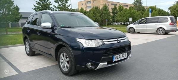 Blue Mitsubishi Outlander 2015 in Siauliai, with an engine capacity of 2.27 L and mileage of 211 thousand km for 8250 €, photo 1 on AUTOMOTO.COM.LV