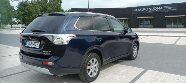 Blue Mitsubishi Outlander 2015 in Siauliai, with an engine capacity of 2.27 L and mileage of 211 thousand km for 8250 €, photo 6 on AUTOMOTO.COM.LV