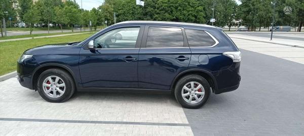 Blue Mitsubishi Outlander 2015 in Siauliai, with an engine capacity of 2.27 L and mileage of 211 thousand km for 8250 €, photo 7 on AUTOMOTO.COM.LV